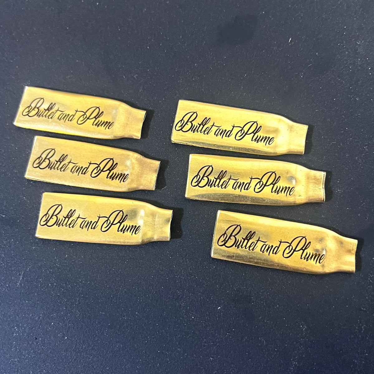 Flattened 223 Brass w/ Bullet and Plume Engraved Bullet Casings Qty 12 ...